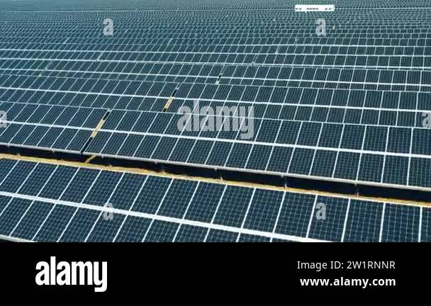 Rows of solar batteries at the solar power farm. Modern solar panels ...