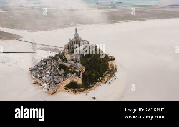 drone flying left high above mont saint michel famous landmark island ...