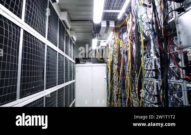 Inside room with data centers and cables. Stock footage. Room with data centers, cables and ...