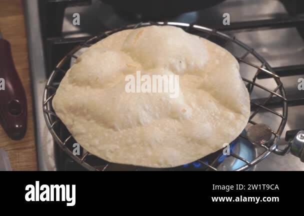preparation of bread according to the Indian recipe. naan, chapati ...