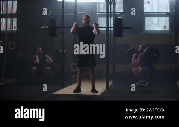 Three fitness man bodybuilder training using barbell weightlifting ...