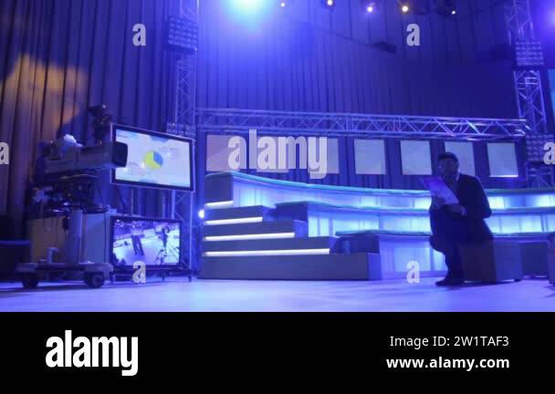 Male man TV presenter in a TV studio. TV presenter. TV host Stock Video ...