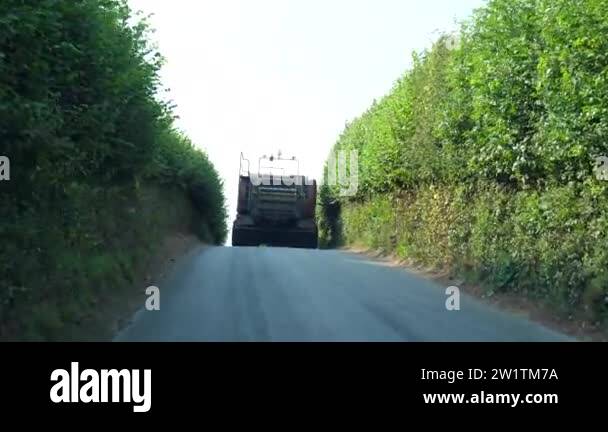 Car behind tractor Stock Videos & Footage - HD and 4K Video Clips - Alamy