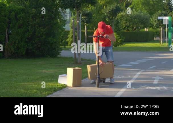 Postman delivering packages Stock Videos & Footage - HD and 4K Video ...