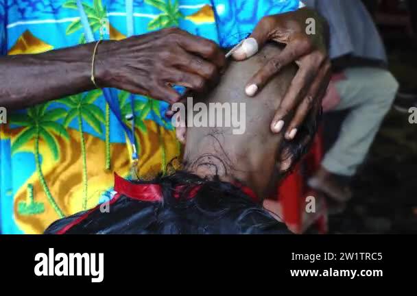 Devotee cut hair during Thaipusam at Penang Stock Video Footage - Alamy
