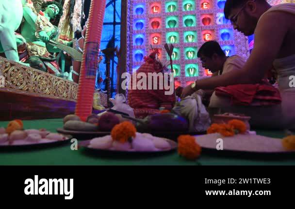 Howrah, West Bengal, India - 5th October 2019 : Hindu Bengali priests chanting Sanskrit shlokas ...