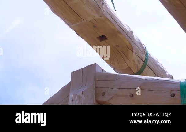 Part of the frame of a wooden house, details of a truss wooden ...