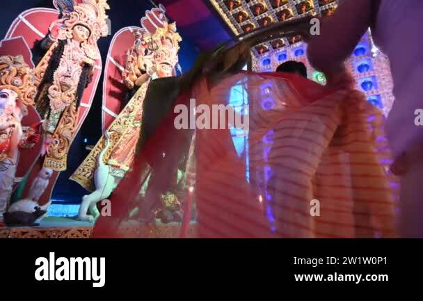 Howrah,West Bengal,India - 5th October 2019 : Red shari being draped on ...