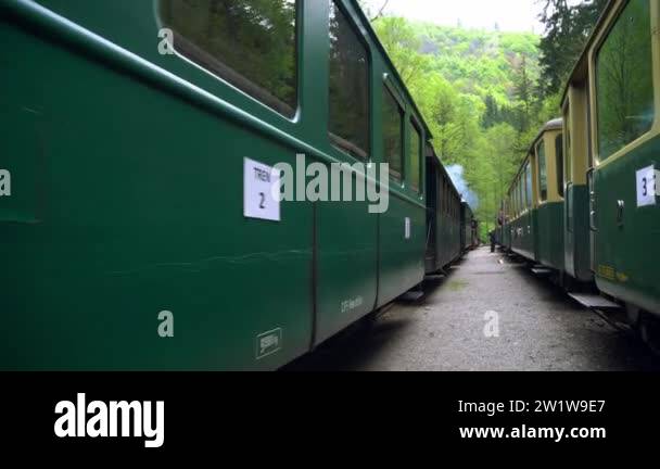 walk between retro trains, Old steam locomotive close-up, Steam narrow ...