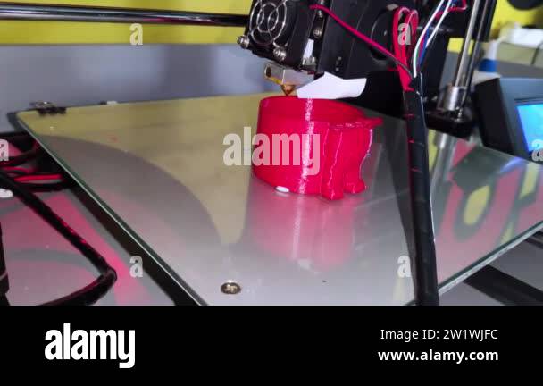 A modern 3D printer at work. Macro photography of a CNC machine that ...