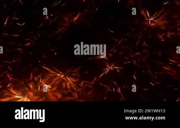 Burning red hot sparks fly from large fire in the night sky. Beautiful ...