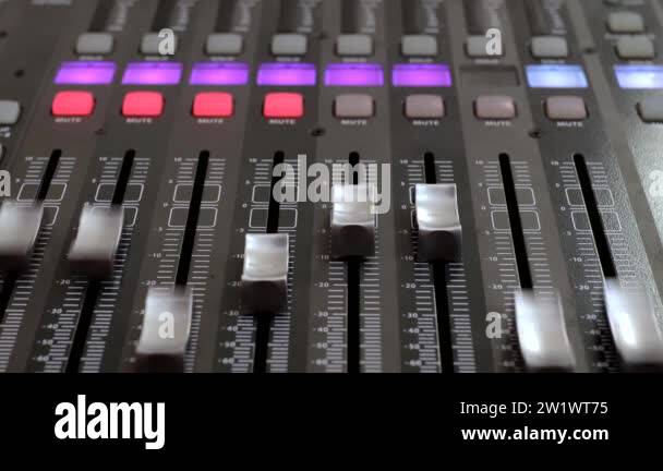 Remote control for adjusting the sound. Audio mixer. Sound engineer adjusts the sound. Music ...