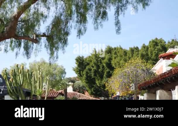 Mexican colonial style suburban, hispanic house exterior, green lush ...