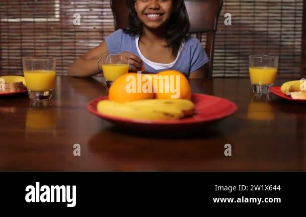 Girl eating fruits Stock Videos & Footage - HD and 4K Video Clips - Alamy