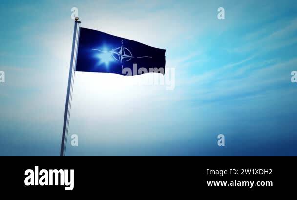 NATO flag waving depicts North Atlantic treaty organization. An emblem ...