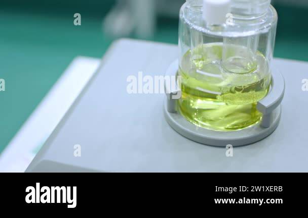 Magnetic mixer stirrer with fast moving stir bar for mixing liquid at ...