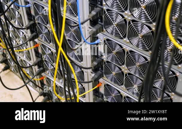 Wall of data centers and wires. Stock footage. Lots of units with data ...