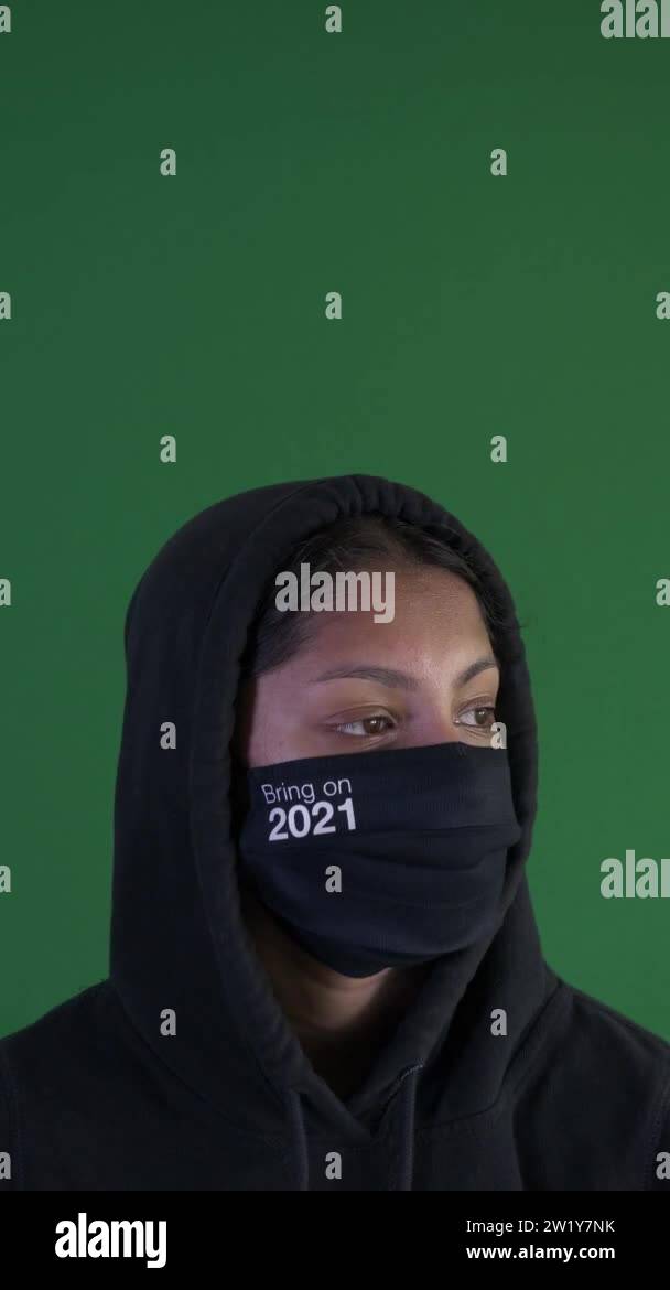 Asian Female Teenager Wearing Hoodie And Bring It On 2021 Face Mask ...
