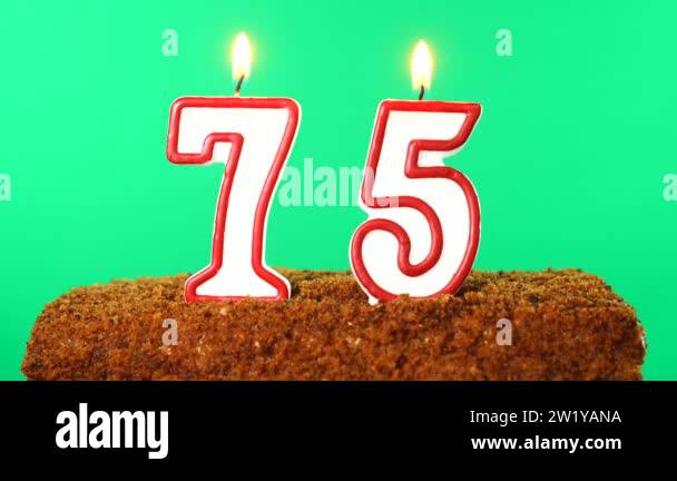 Cake with the number 75 lighted candle. Chroma key. Green Screen ...