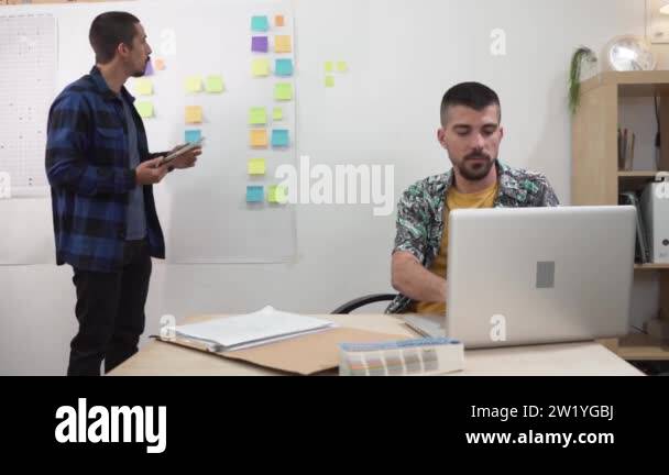 Two business people discussing and planning concept. Colleagues ...