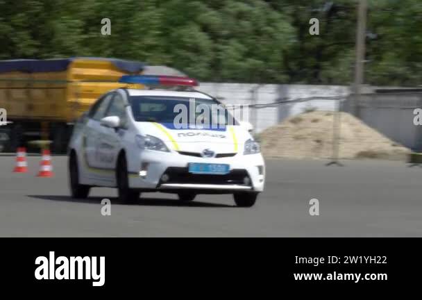 police cars at the autodrome, asphalt autodrome with road markings ...