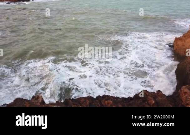 Ocean wave crashing rocks Stock Videos & Footage - HD and 4K Video ...