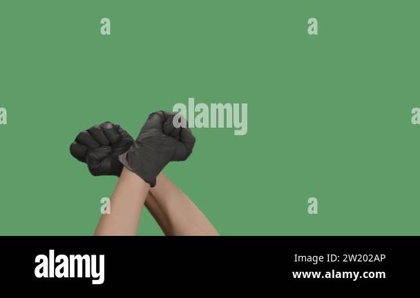 The raised clenched fists is a hand gesture symbol of solidarity ...