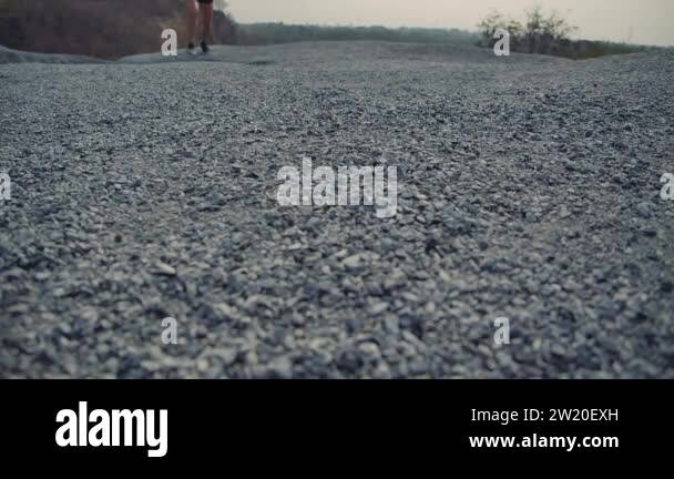 SUPER SLOW MOTION, Close up Trail Running in the rock mountain slide ...