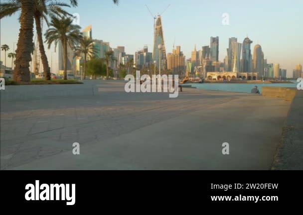 Doha corniche in Doha Qatar afternoon shot showing people walking ...
