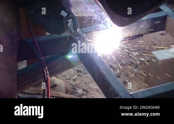 Footage of welder working, man welding steel beams Stock Video Footage ...