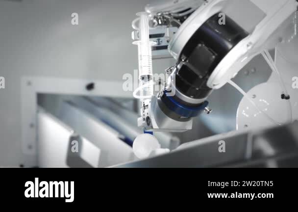 The innovative arms of a robotic arm make an injection of chemotherapy for a cancer patient. New ...