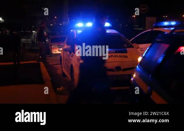 Police cars at night. Police car chasing a car at night with fog ...