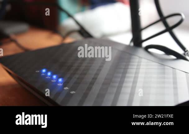 Blinking of the signal indicator on the Wi-Fi router. Wi-Fi router with ...