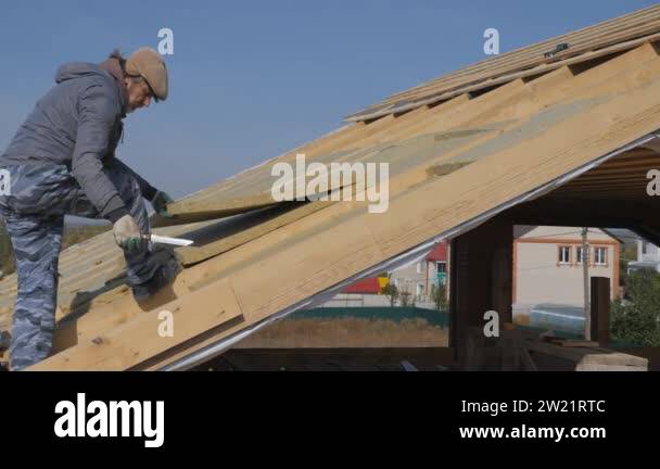 Installation of insulation for insulation of the roof. Use of mineral ...