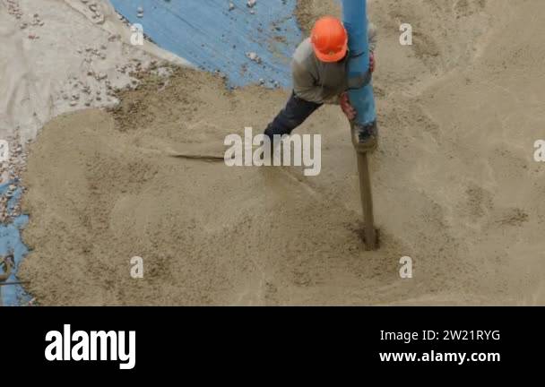 Construction worker pouring concrete Stock Videos & Footage - HD and 4K ...