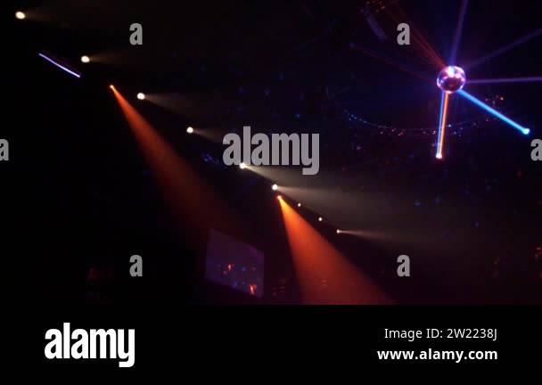 Shiny disco ball at rave party in nightclub.Mirror sphere with glitter ...