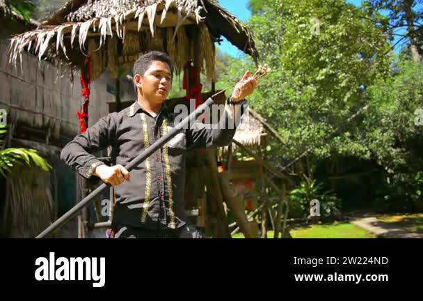 Professional tour guide explains and demonstrates the use of a ...