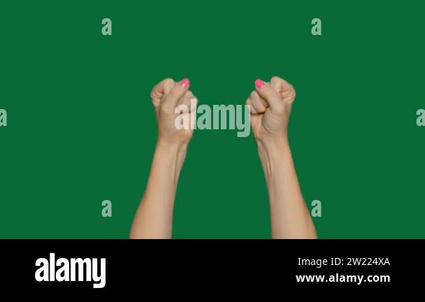 Woman hand clenched fist and rise up. Gestures by hand green screen ...