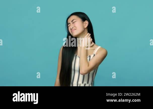 Fatigued unhealthy asian woman with long straight black hair suffering ...