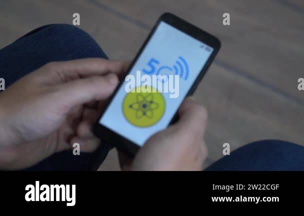 5g network danger concept. Man putting a smartphone to his ear. Back ...