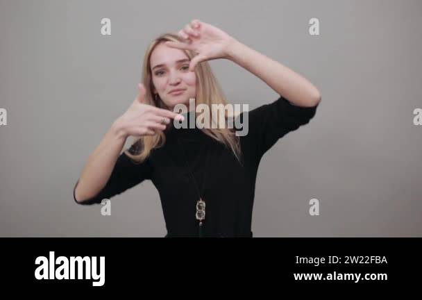 Hands making photo frame, fingers framing distance, photography sign ...