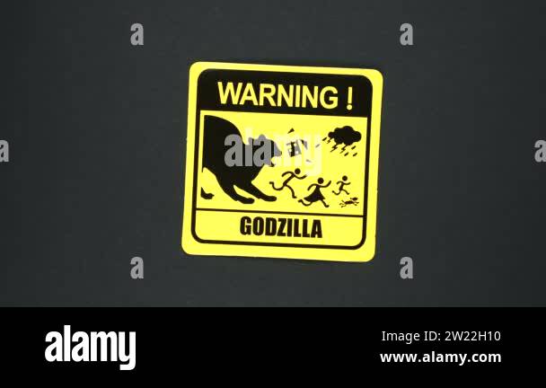 Godzilla warning sign word text Stock Video Footage - Alamy
