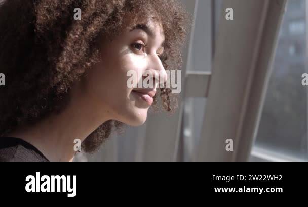 Side view close-up female face of African girl. Portrait of mixed race ...