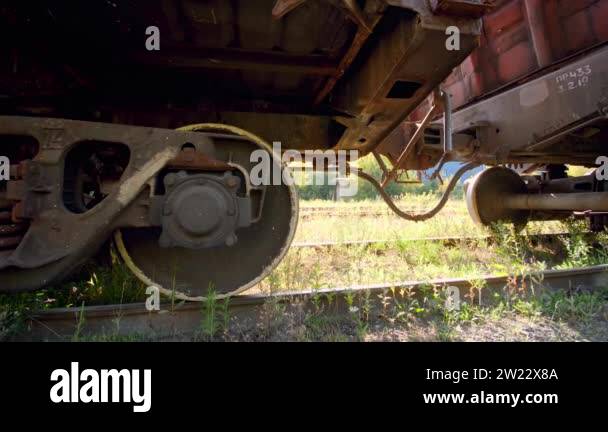 4k dolly video of old rusty cargo train car on abandoned railroad ...