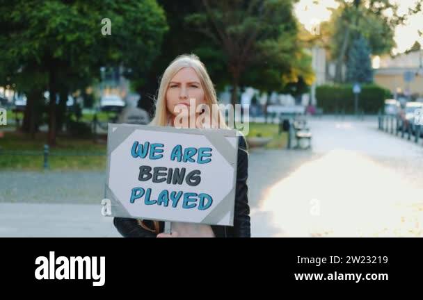 Pretty girl with placard Stock Videos & Footage - HD and 4K Video Clips ...