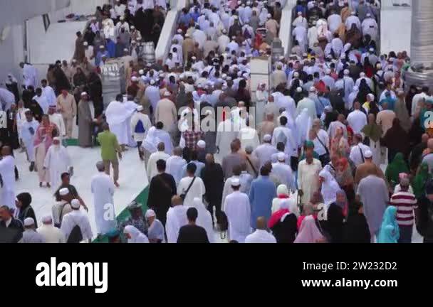 Muslim pilgrims use stairs to exit the Haram Mosque after afternoon ...