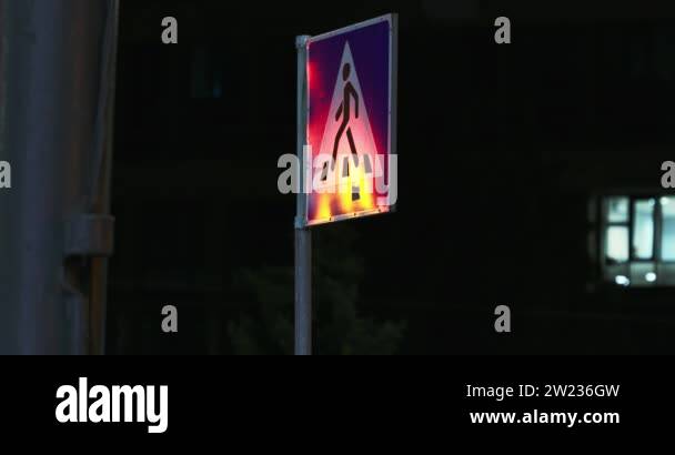 Pedestrian traffic light sign with traffic light glare Stock Video ...
