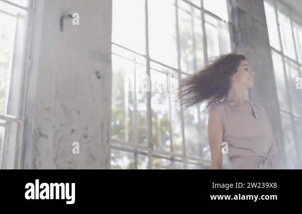 Woman with long hair dancing modern dance. Contemporary freestyle ...