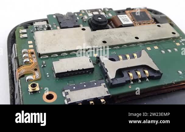 Close-up of a cell phone repair. The internal components of a ...
