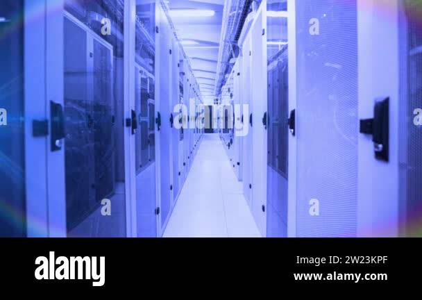 Animation of glowing spots and prism processing digital data flowing through network of computer ...